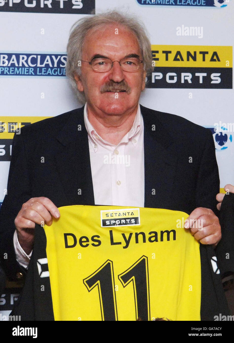 Des Lynam holds a shirt with his name on after it was announced that he ...