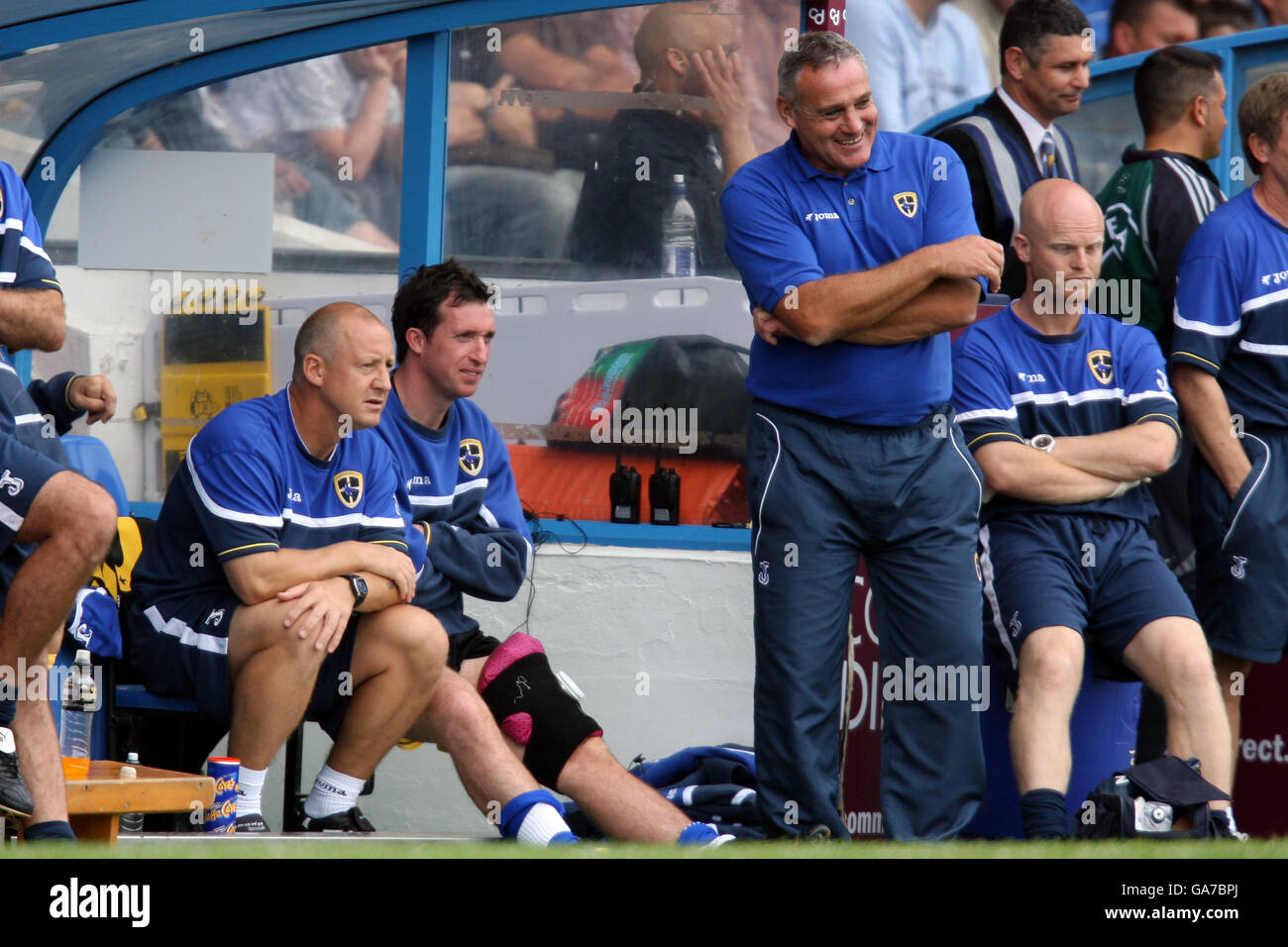 Cardiff citys robbie fowler joke with manager dave jones hi-res stock ...