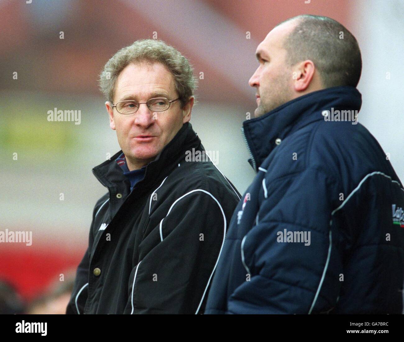 Swindon Town's Manager Malcolm Crosby and Coach Neil Ruddock see their ...
