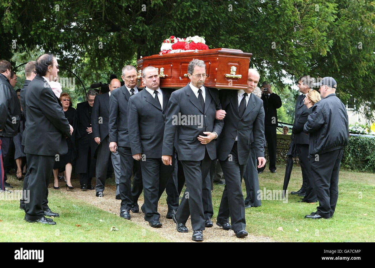 The coffin arrives at the funeral of mike reid hi-res stock photography ...