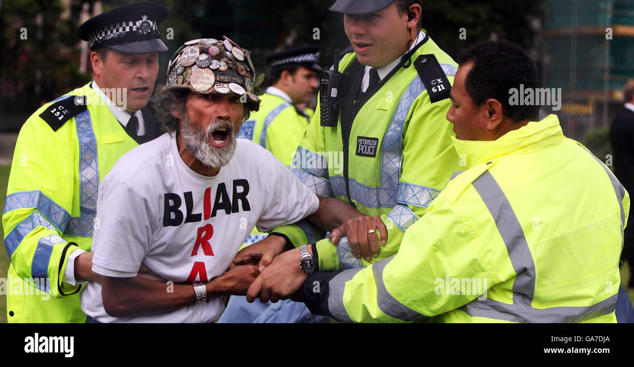 Peace campaigner Brian Haw is evicted by police from his peace camp on Parliament Square in ...