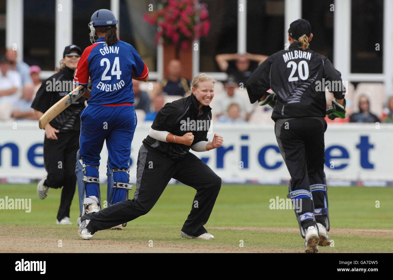 Aimee Mason (centre) of New Zealand celebrates bowling Lydia Greenway ...
