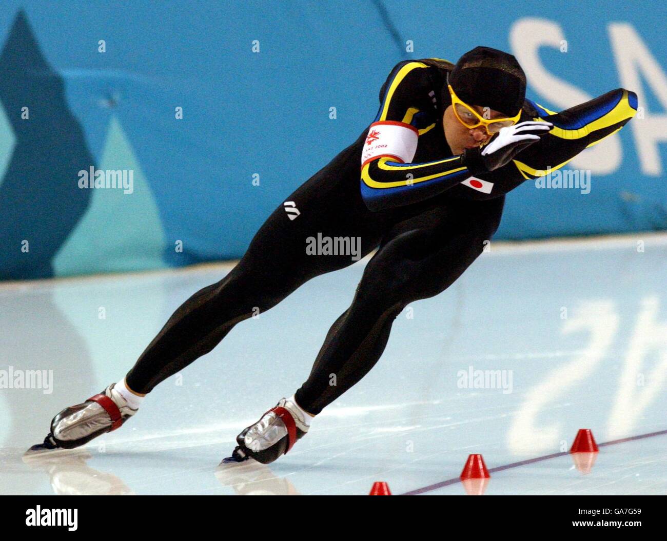 Japan's Manabu Horii in action in the men's 500m speed skating race ...