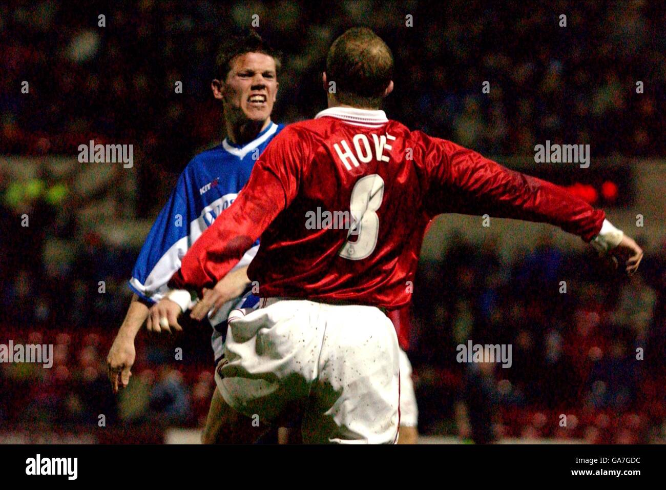 Reading's Sammy Igoe pushes Swindon Town's Bobby Howe leading to him ...