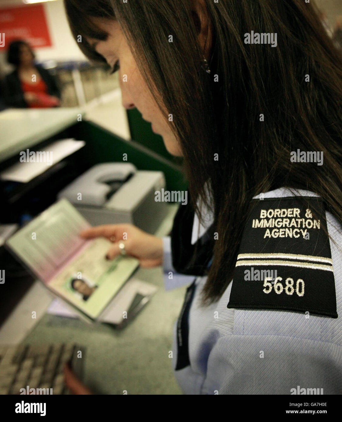 An Immigration officer pictured wearing a brand new uniform at Gatwick ...