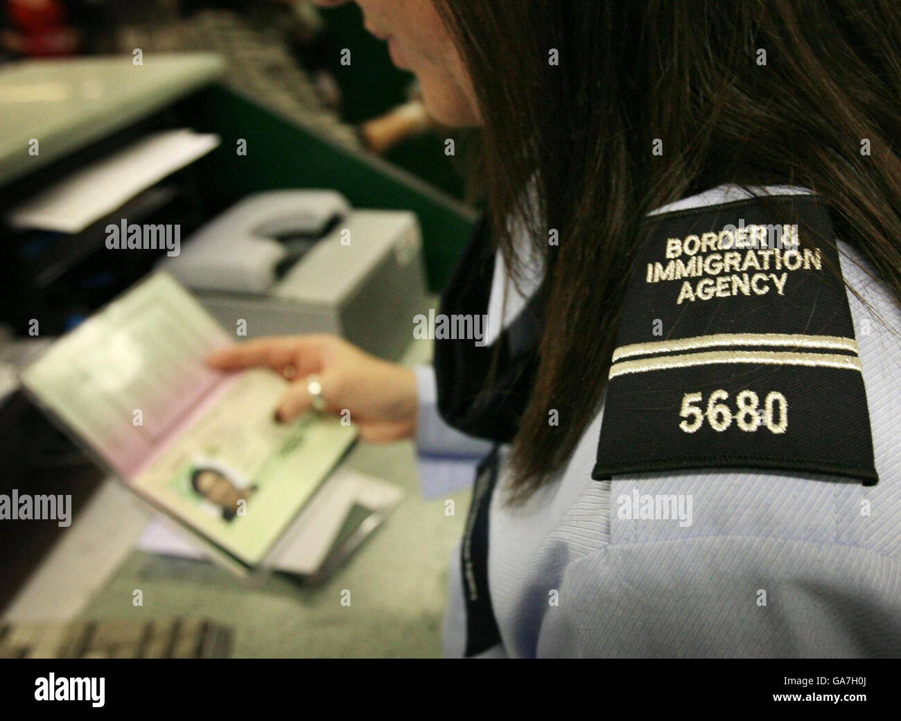 An Immigration officer pictured wearing a brand new uniform at Gatwick ...
