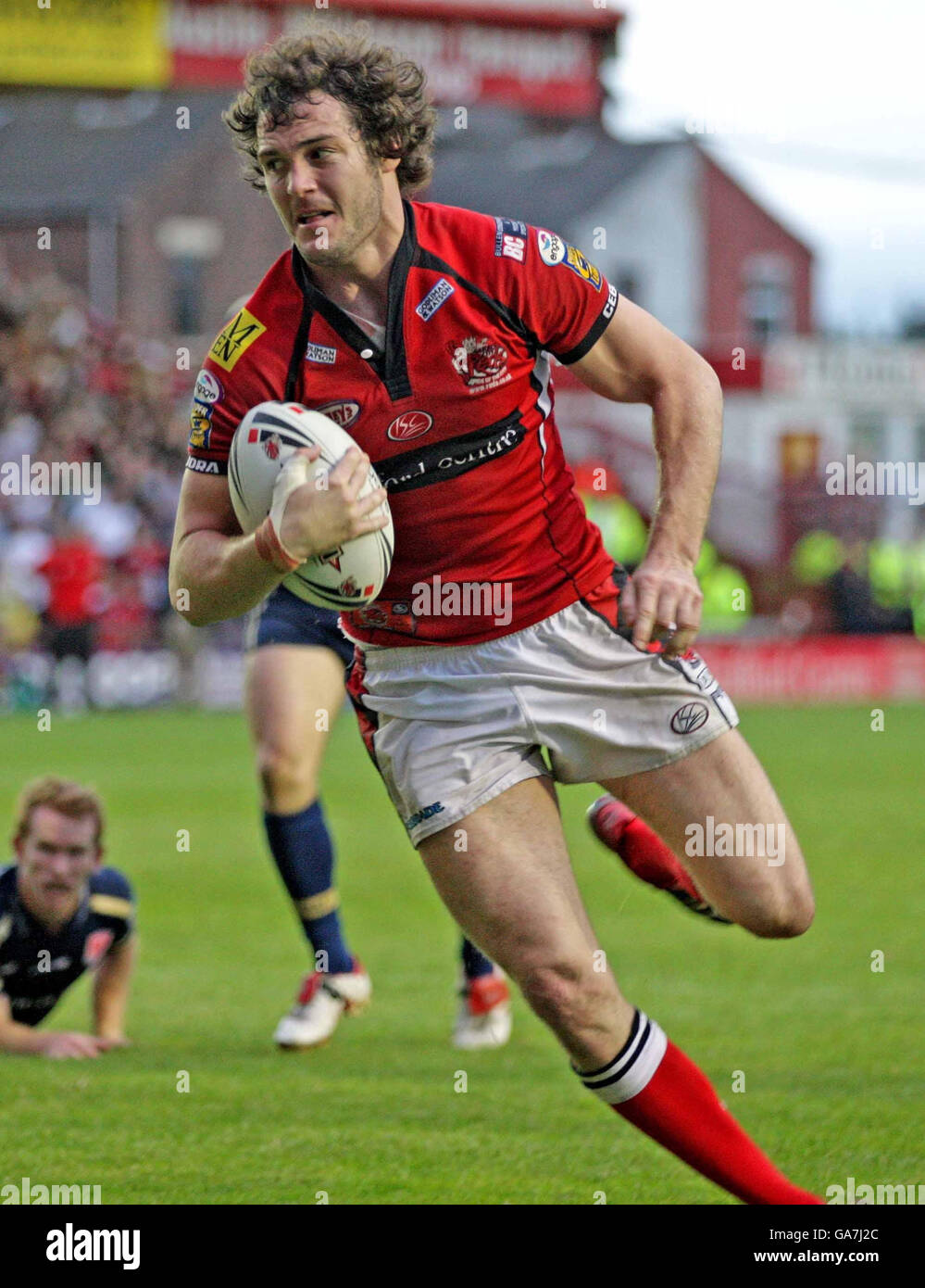Salford's Simon Finnigan runs in the score the second try during the ...