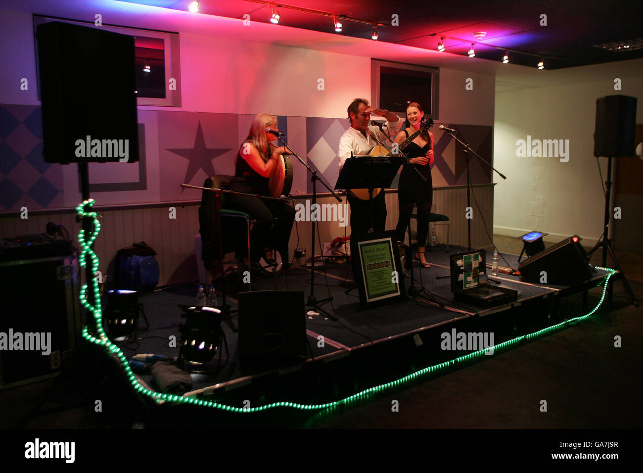 A band playing traditional Irish music perform for visitors during the ...