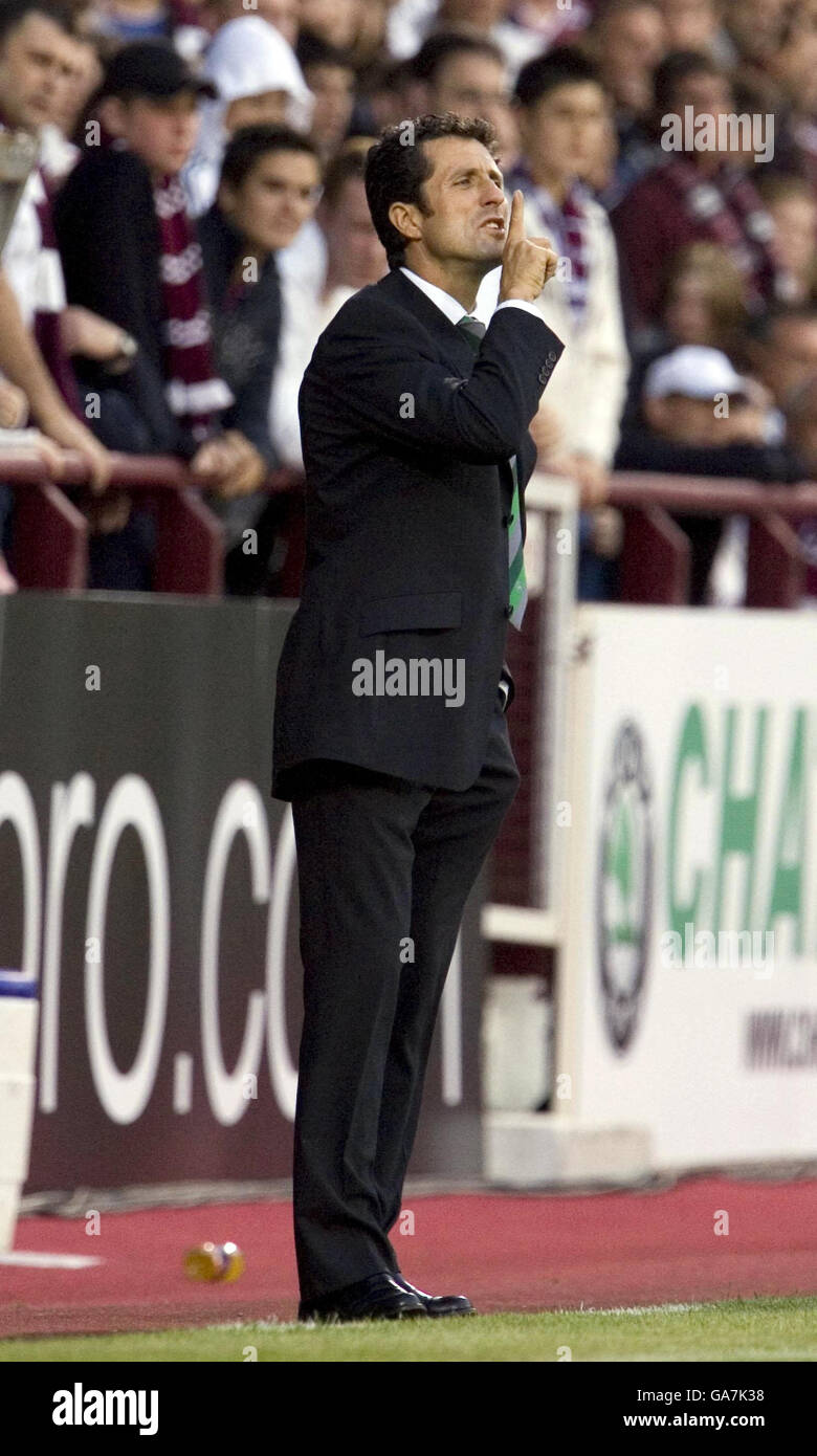Hibernian manager John Collins gestures to his players during the ...