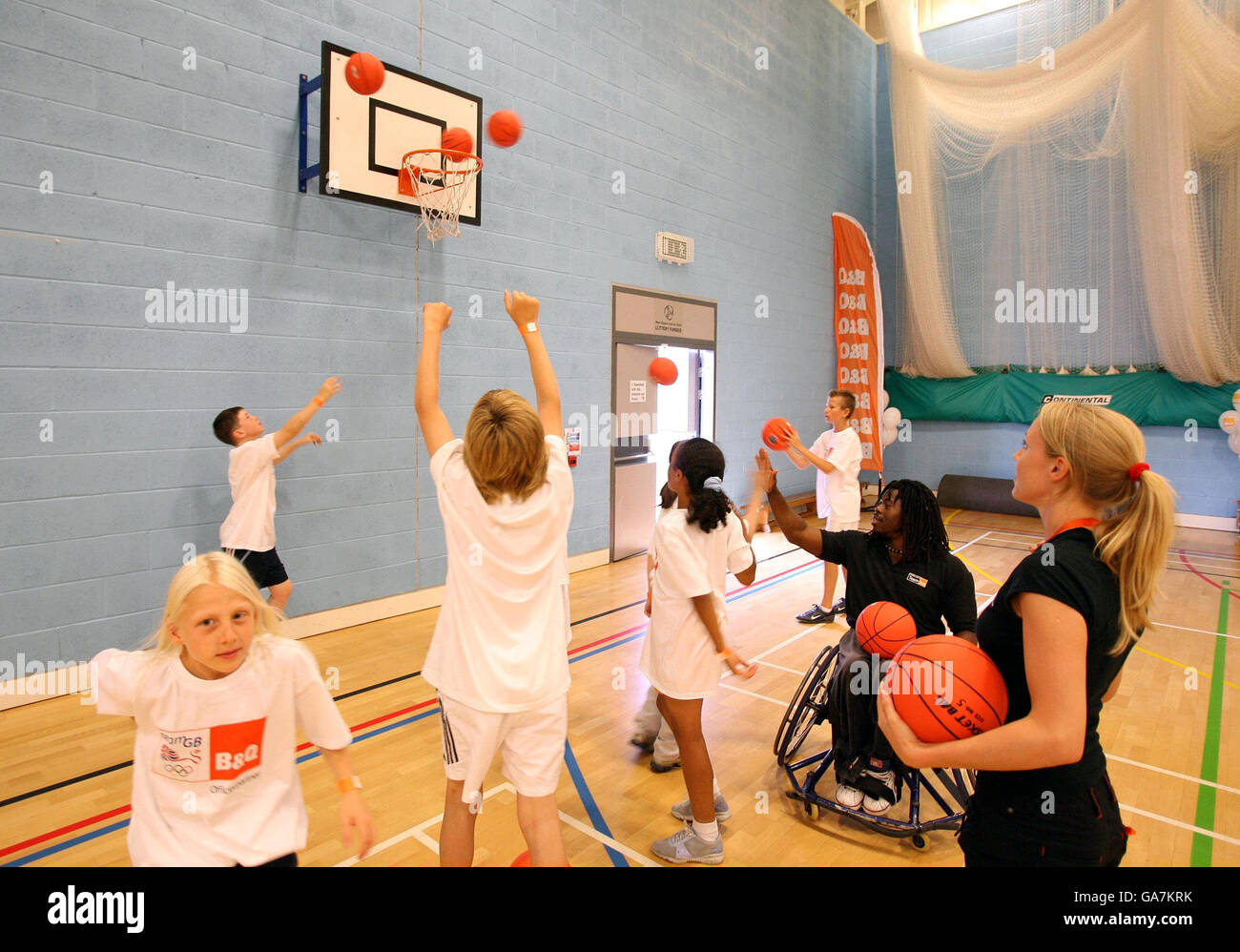 Paralympic medallist Ade Adepitan (second from right) coaches ...