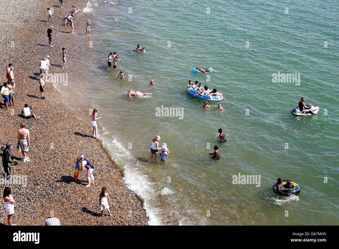 Sunbathers at Brighton Stock Photo - Alamy