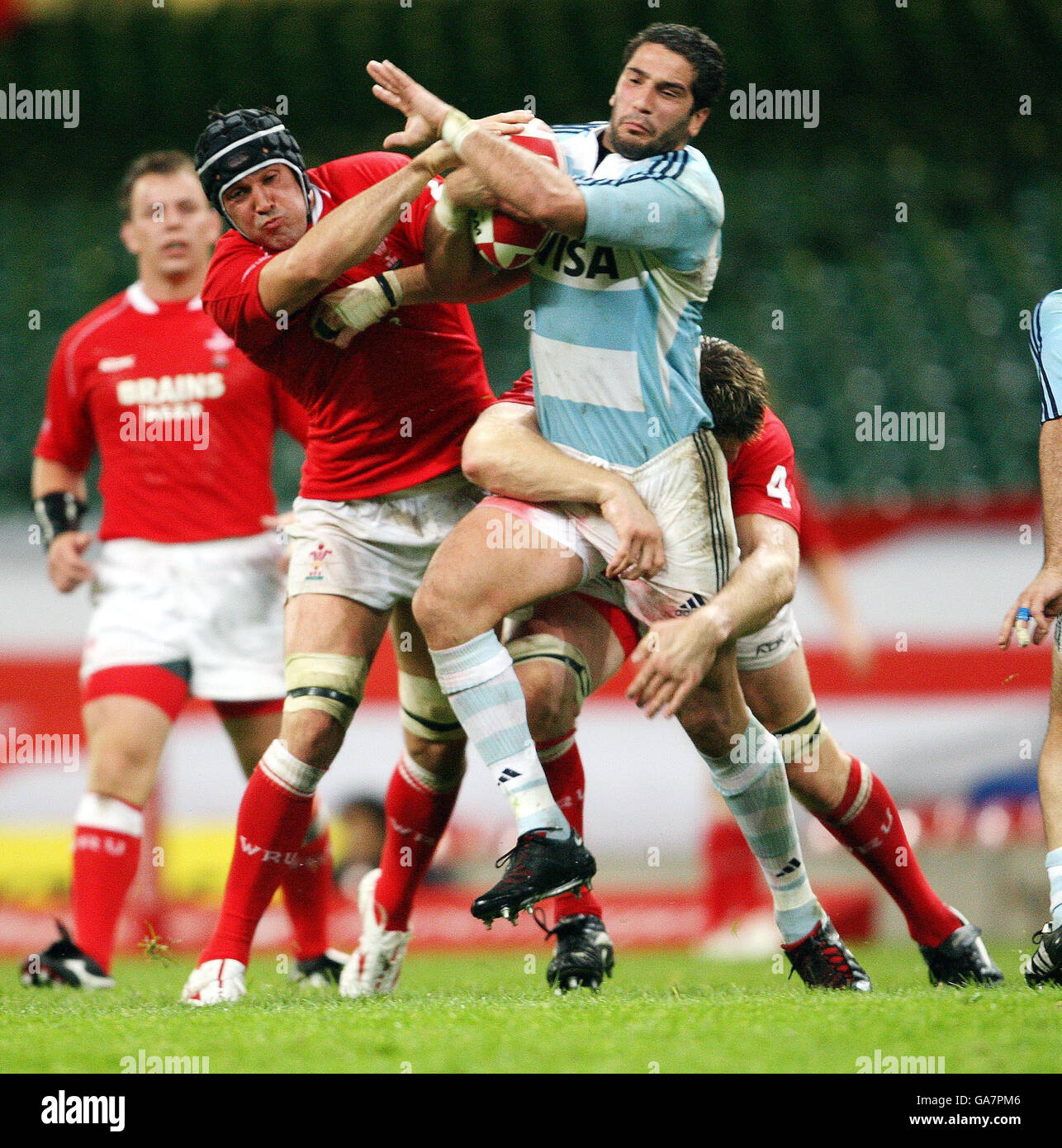 Wales' Jonathan Thomas and Ian Gough combine to stop Argentina's Juan ...