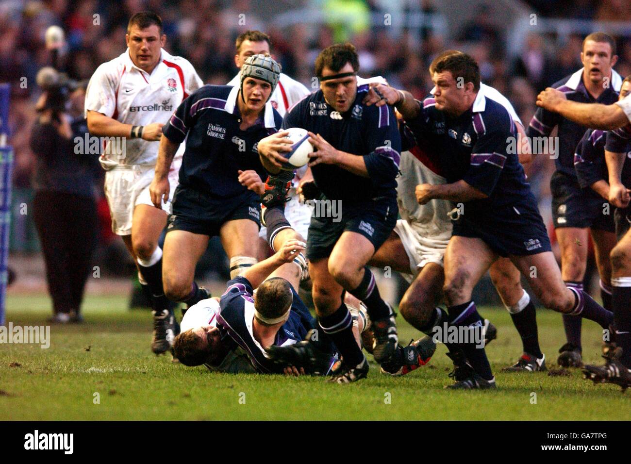Scotlands tom smith breaks through the england defence hi-res stock ...