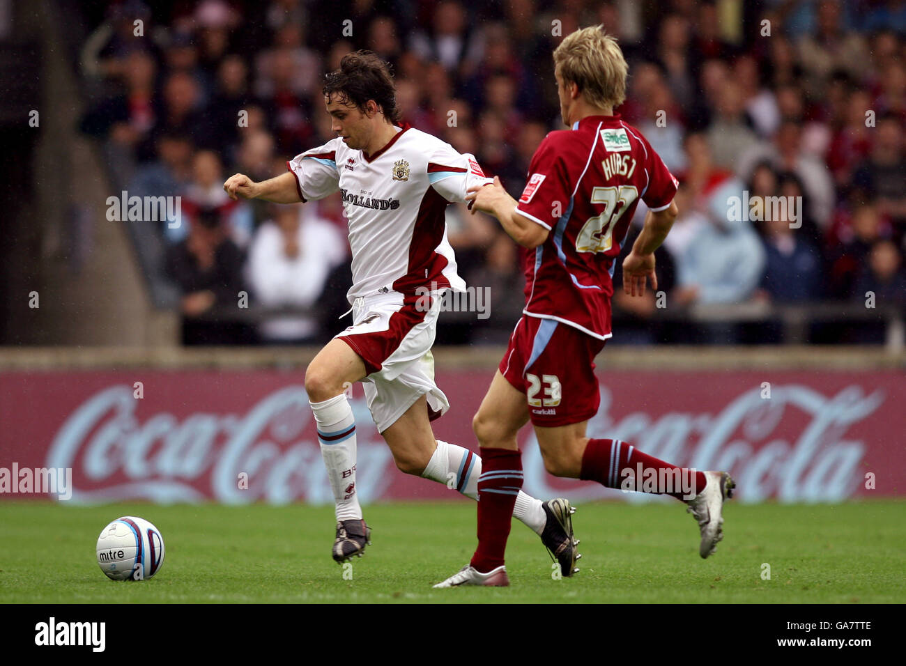 Scunthorpe United's Kevan Hurst (right) and Burnley's Michael Duff ...
