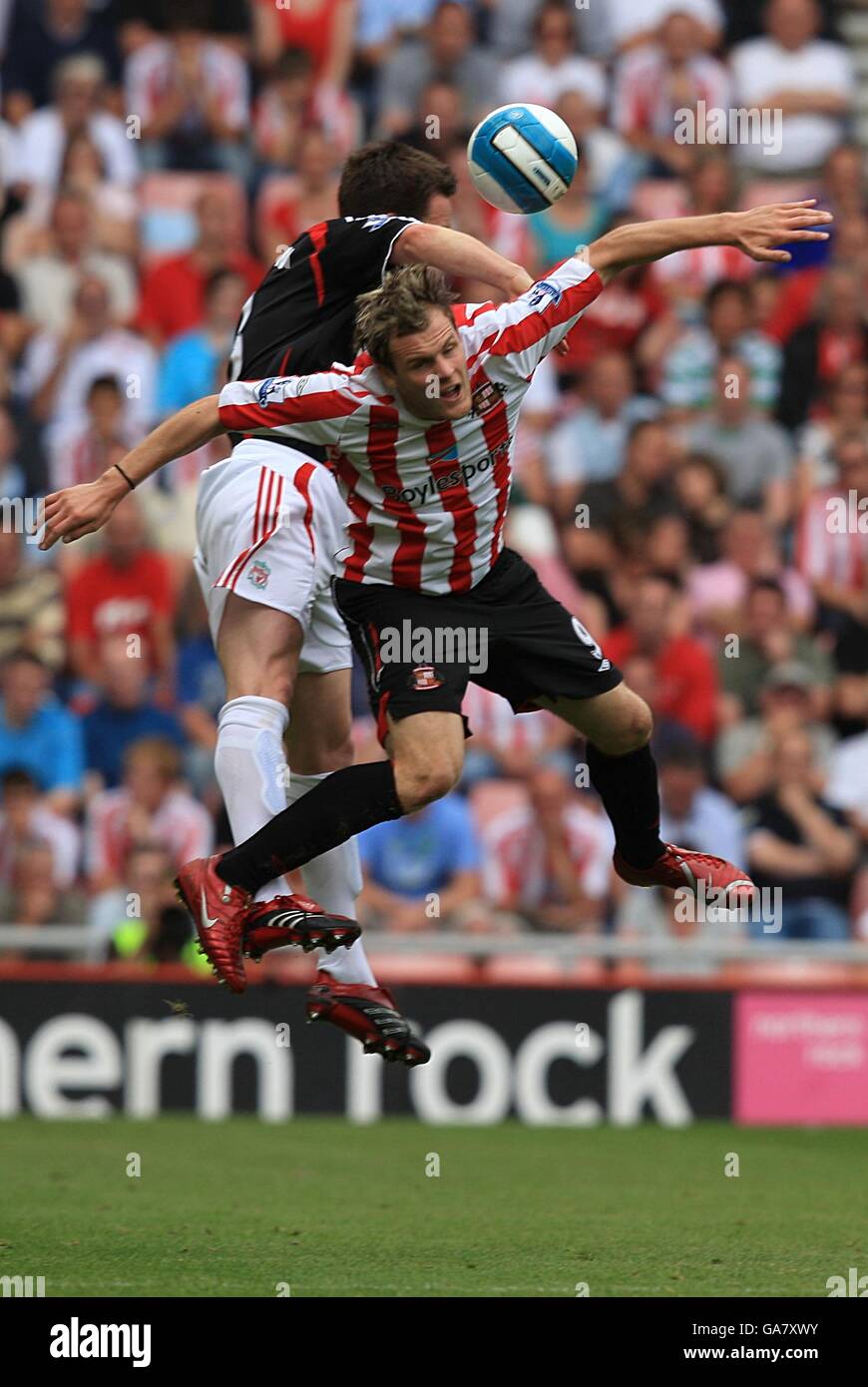 Steve Finnan, Liverpool and Anthony Stokes, Sunderland battle for the ...