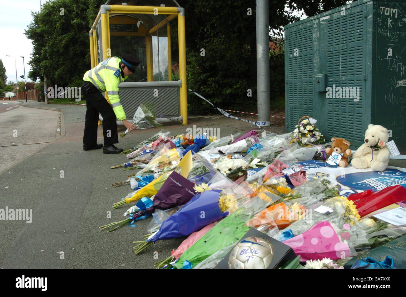 Flowers laid outside the Fir Tree pub, Croxteth Park, in memory of ...