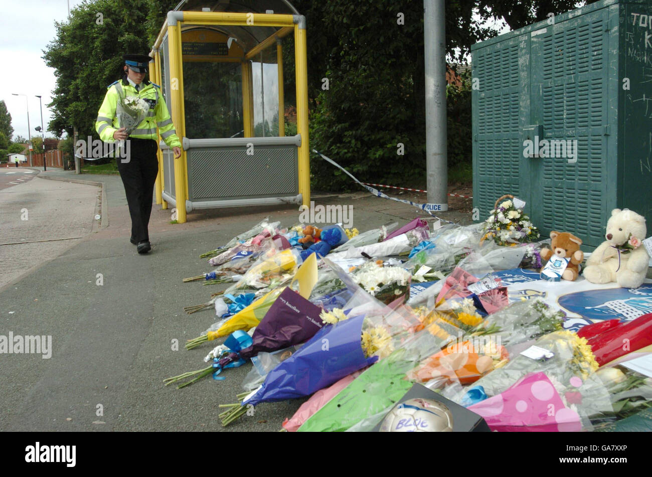 Flowers laid outside the Fir Tree pub, Croxteth Park, in memory of ...