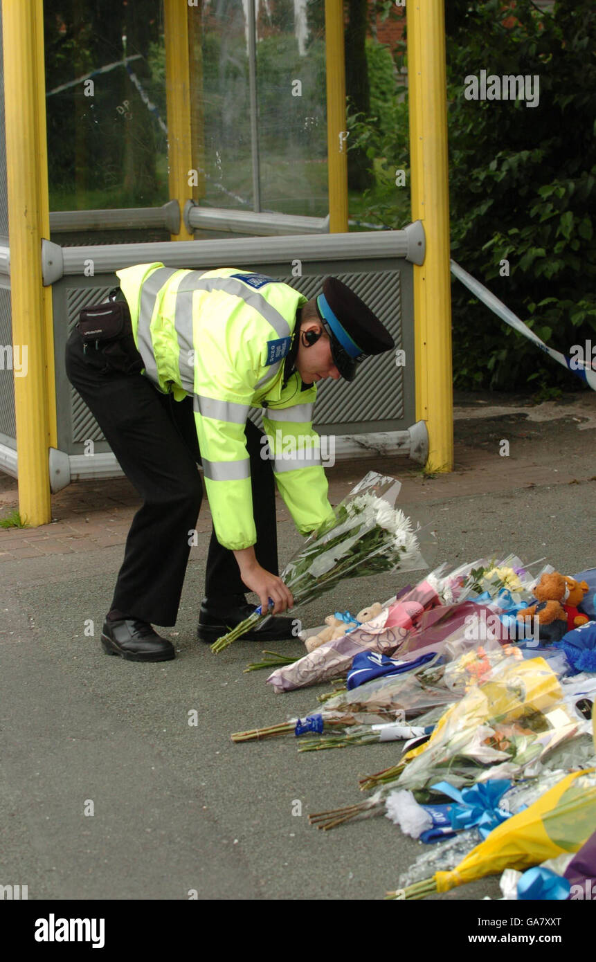 Flowers laid outside the Fir Tree pub, Croxteth Park, in memory of ...