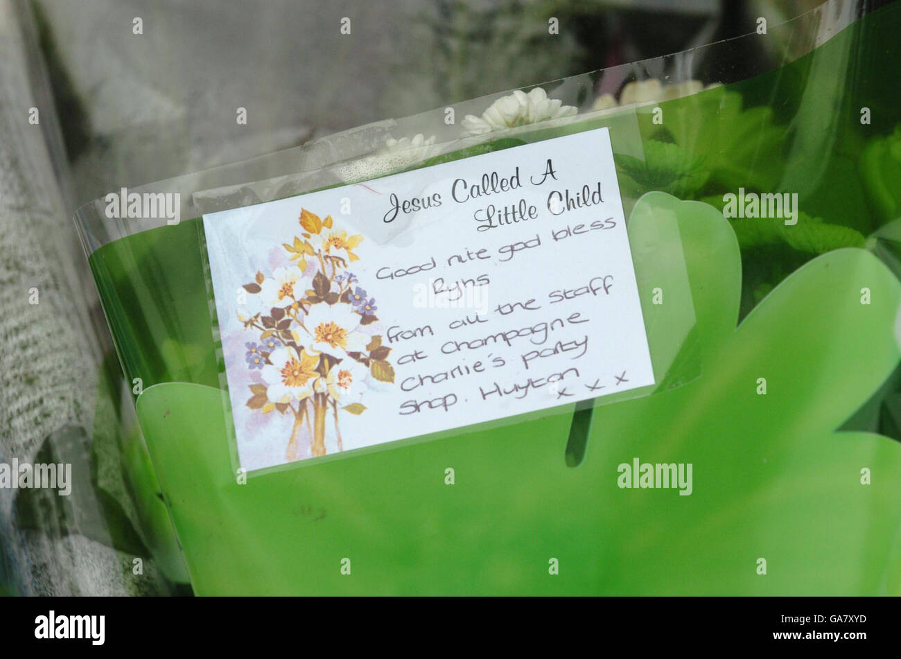 Tributes on flowers laid outside the Fir Tree pub, Croxteth Park, in ...