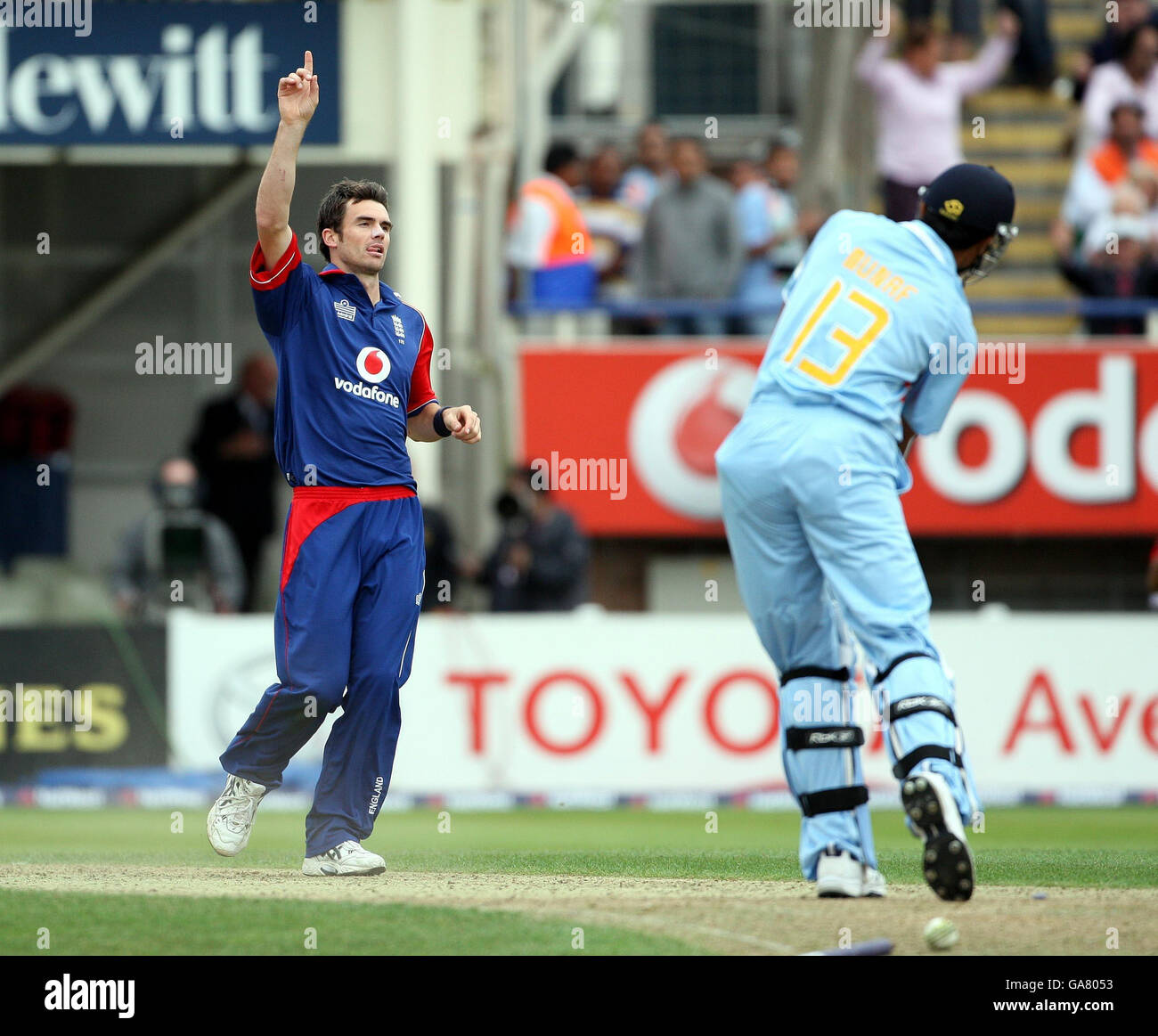 England's James Anderson claims the wicket of India's Munaf Patel ...