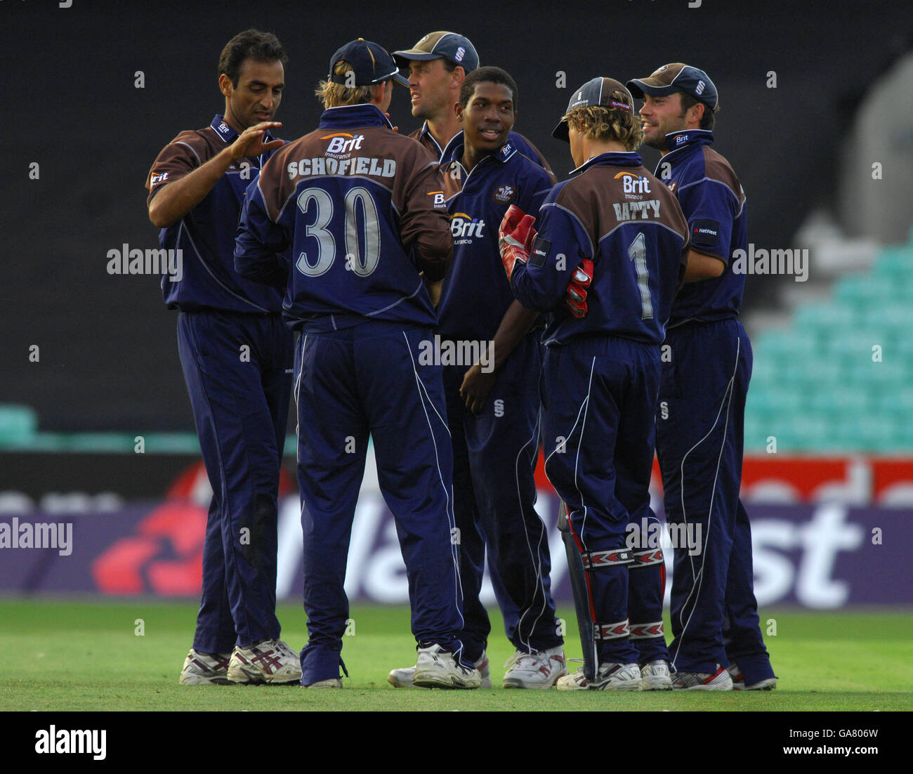 Surrey Brown Caps' celebrate the wicket of Glamorgan Dragons' Michael O ...