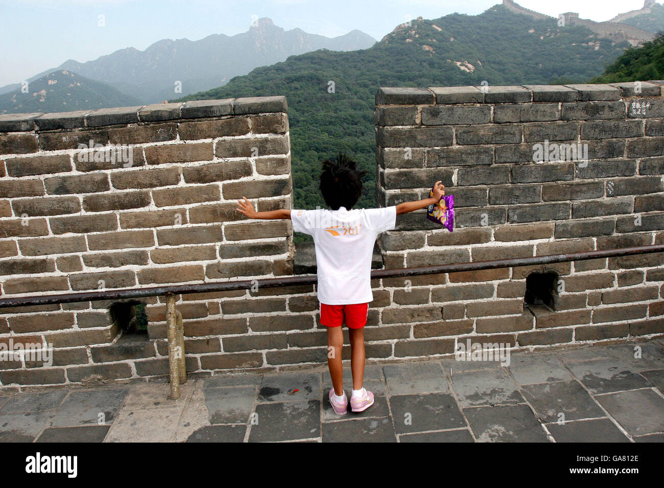 Eight-Year-Old Child Runs Across China Stock Photo - Alamy