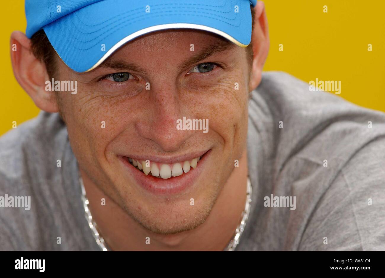 Jenson button relaxes in the paddock at albert park hi-res stock ...