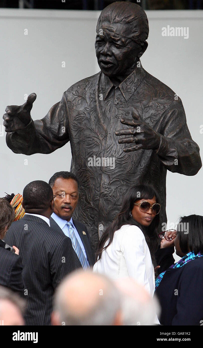 Jesse Jackson and model Naomi Campbell view a statue of former South ...