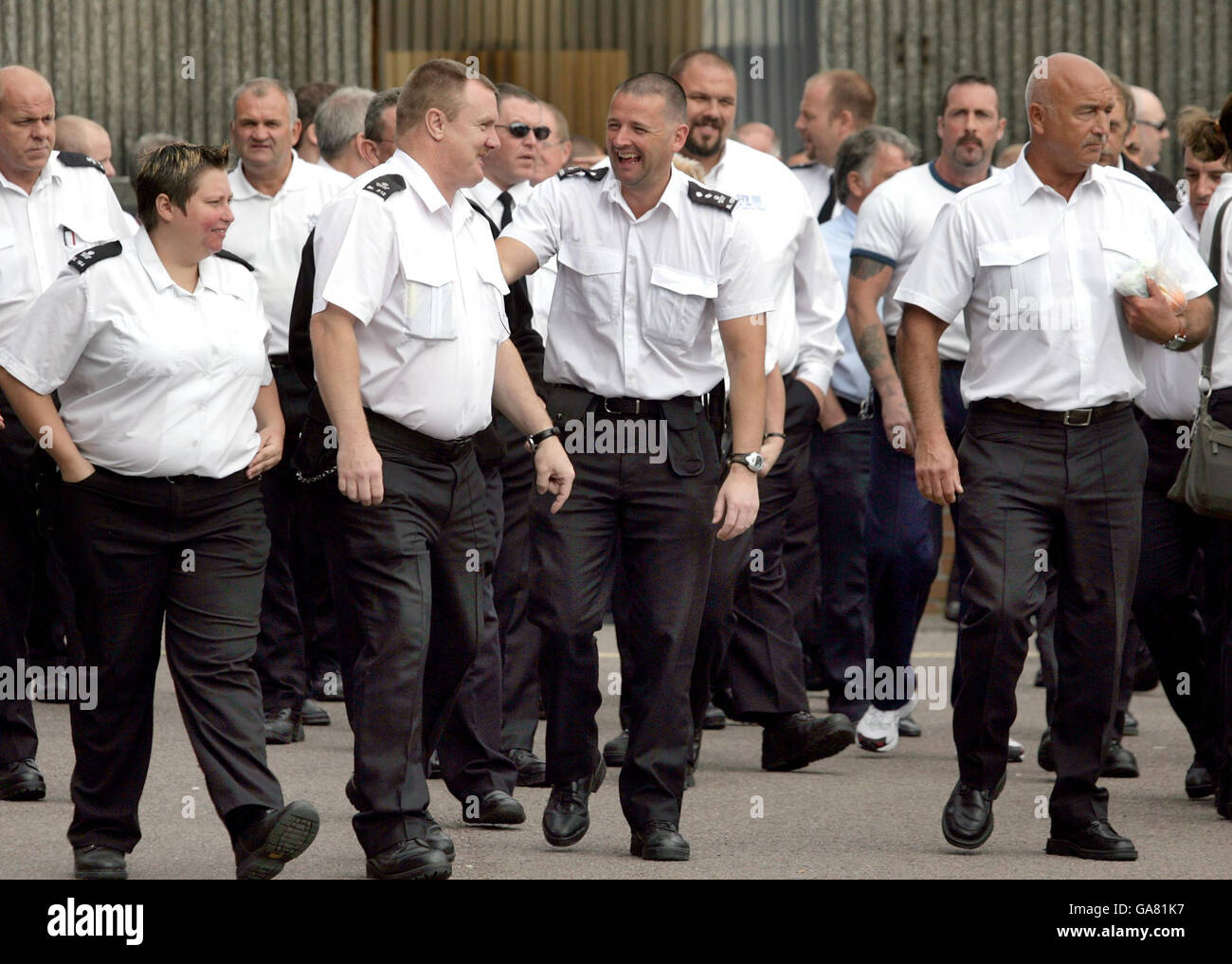 Prison staff disperse after holding a meeting outside HMP Bristol, as ...