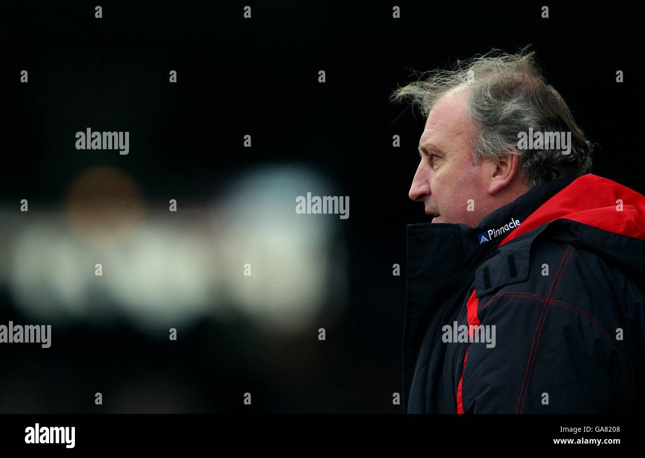 Nottingham Forest's manager Paul Hart watches his team in action ...