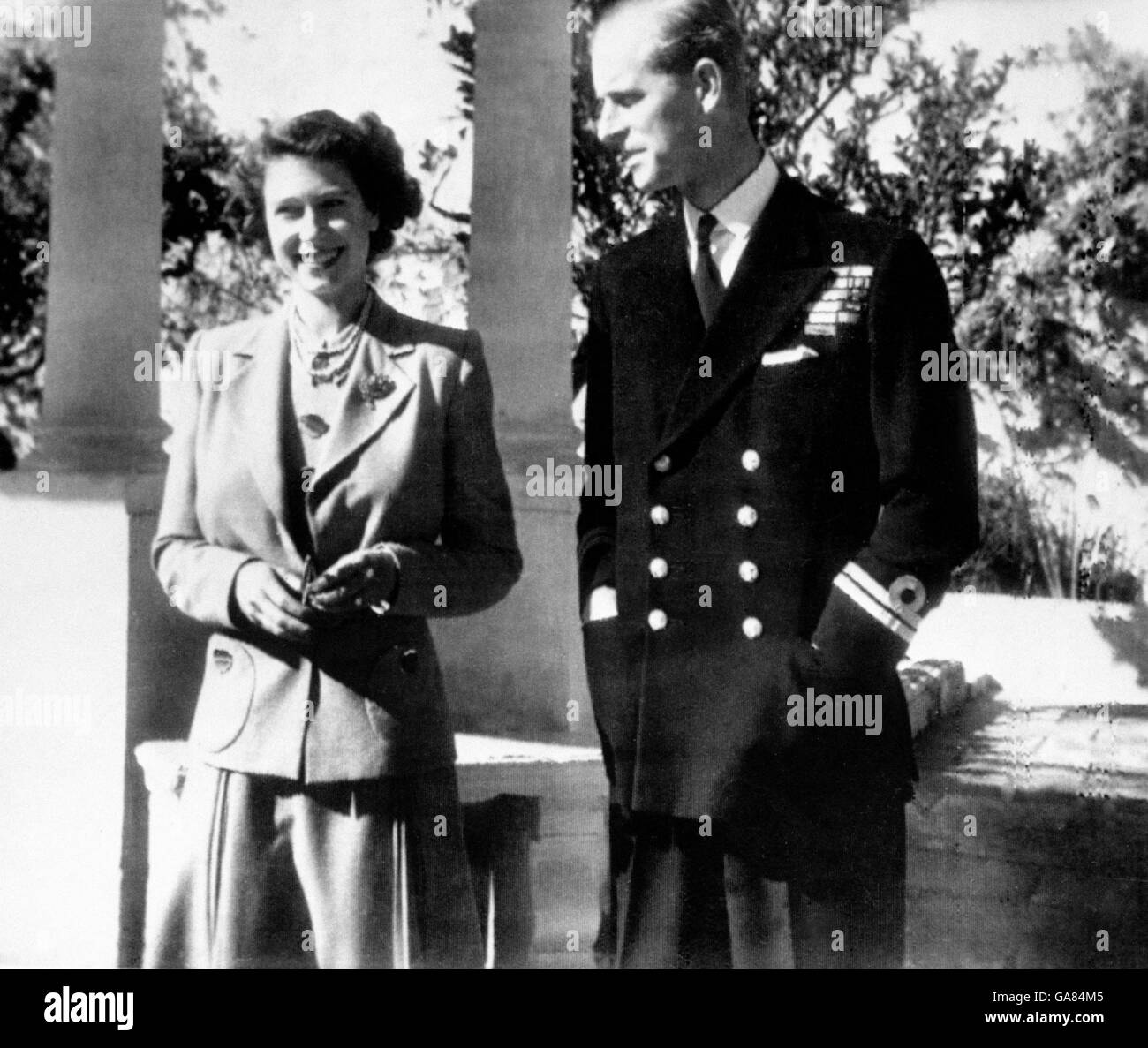 Princess Elizabeth smiling happily as, with the Duke of Edinburgh, she ...