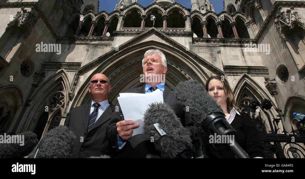 Neil Hunt (centre), Chief Executive of the Alzheimers Society gives a ...