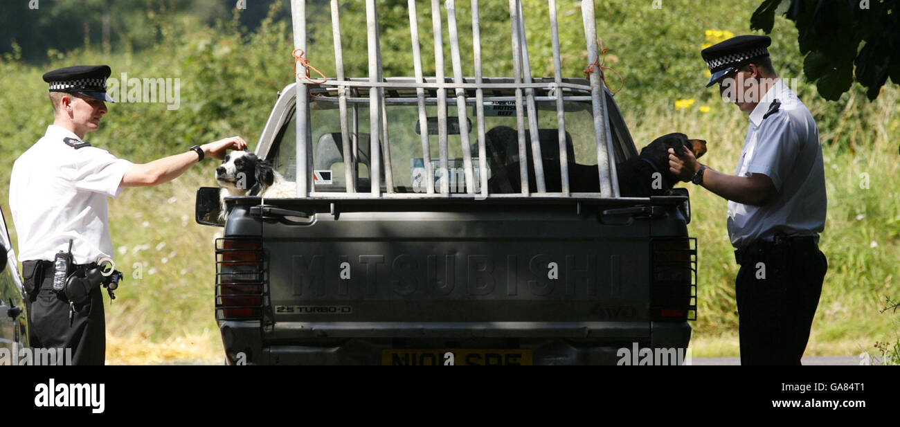 Surrey police officers investigating hi-res stock photography and ...