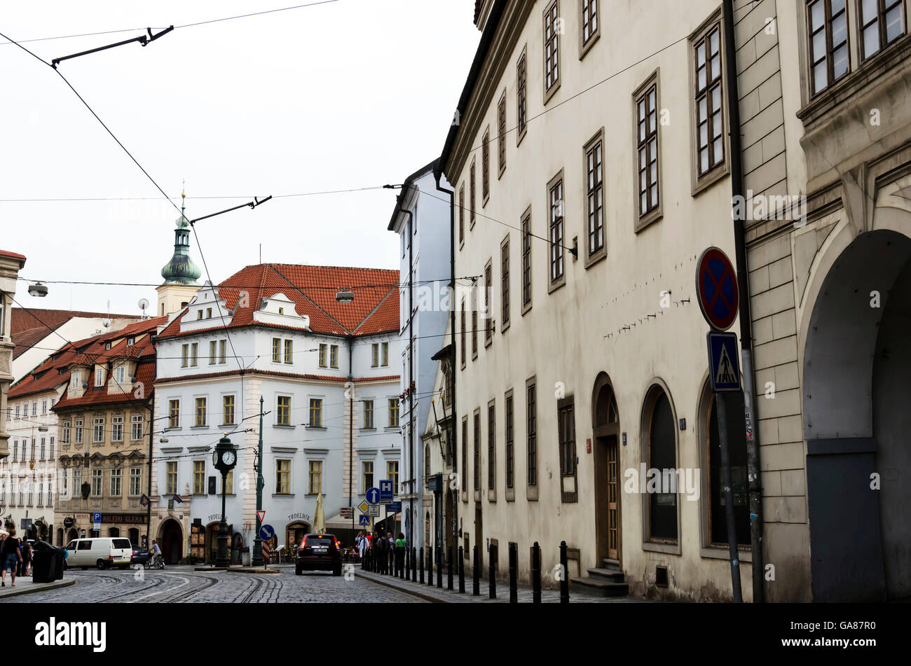 Decorative buildings and a four-faced clock near the centre of Prague ...