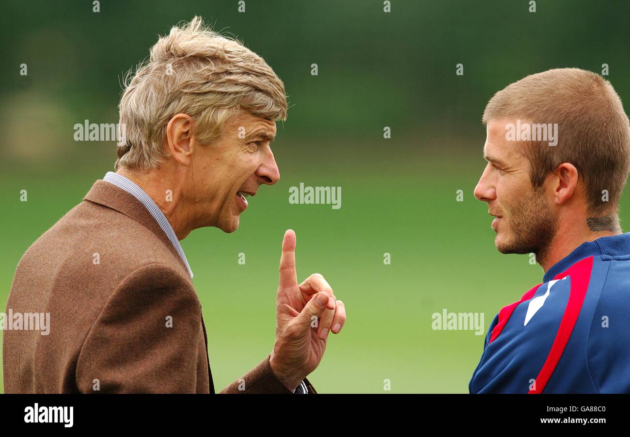 Arsenal manager Arsene Wenger and England's David Beckham talk during ...