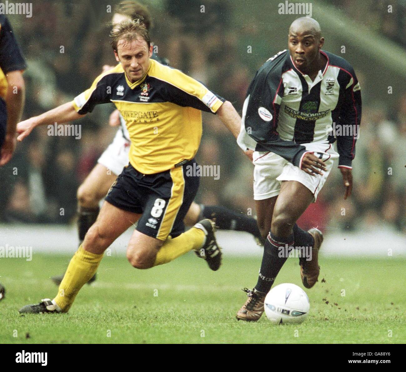 West Bromwich Albion's Jason Roberts and Cheltenham Town's Mark Yates ...