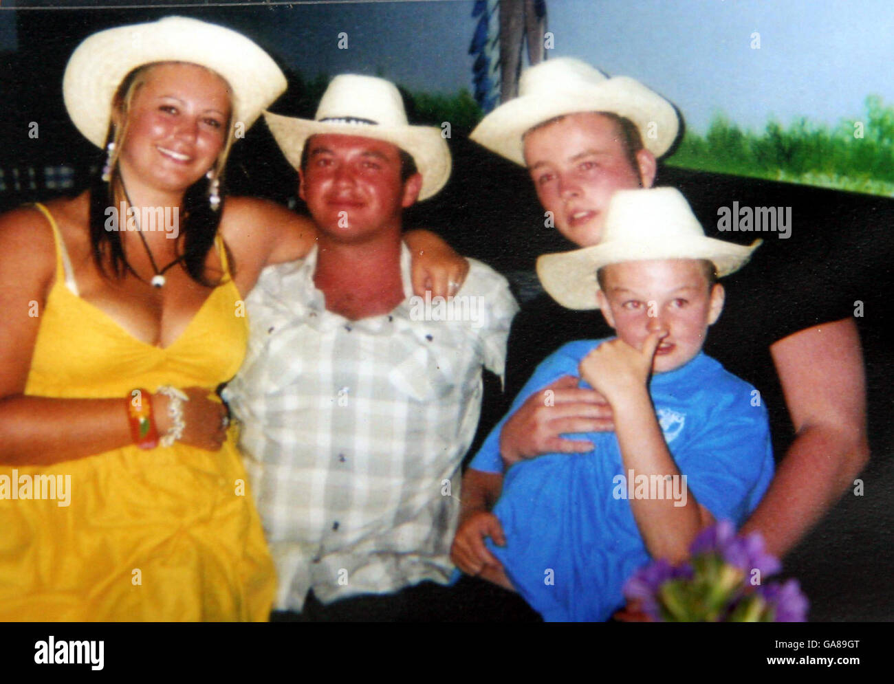 A photograph showing Rhys Jones, (seated right) with unidentified ...