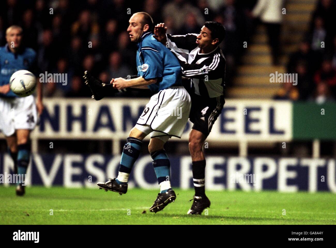 Manchester City's Danny Tiatto cant keep the ball away from Newcastle ...