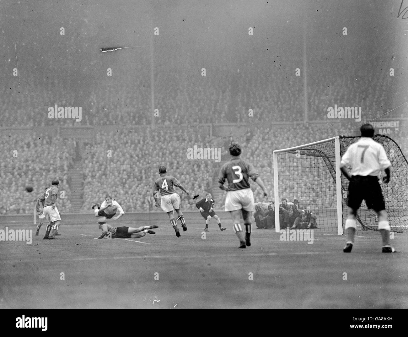 General action shot of today's match. England's Stan Mortensen can be ...