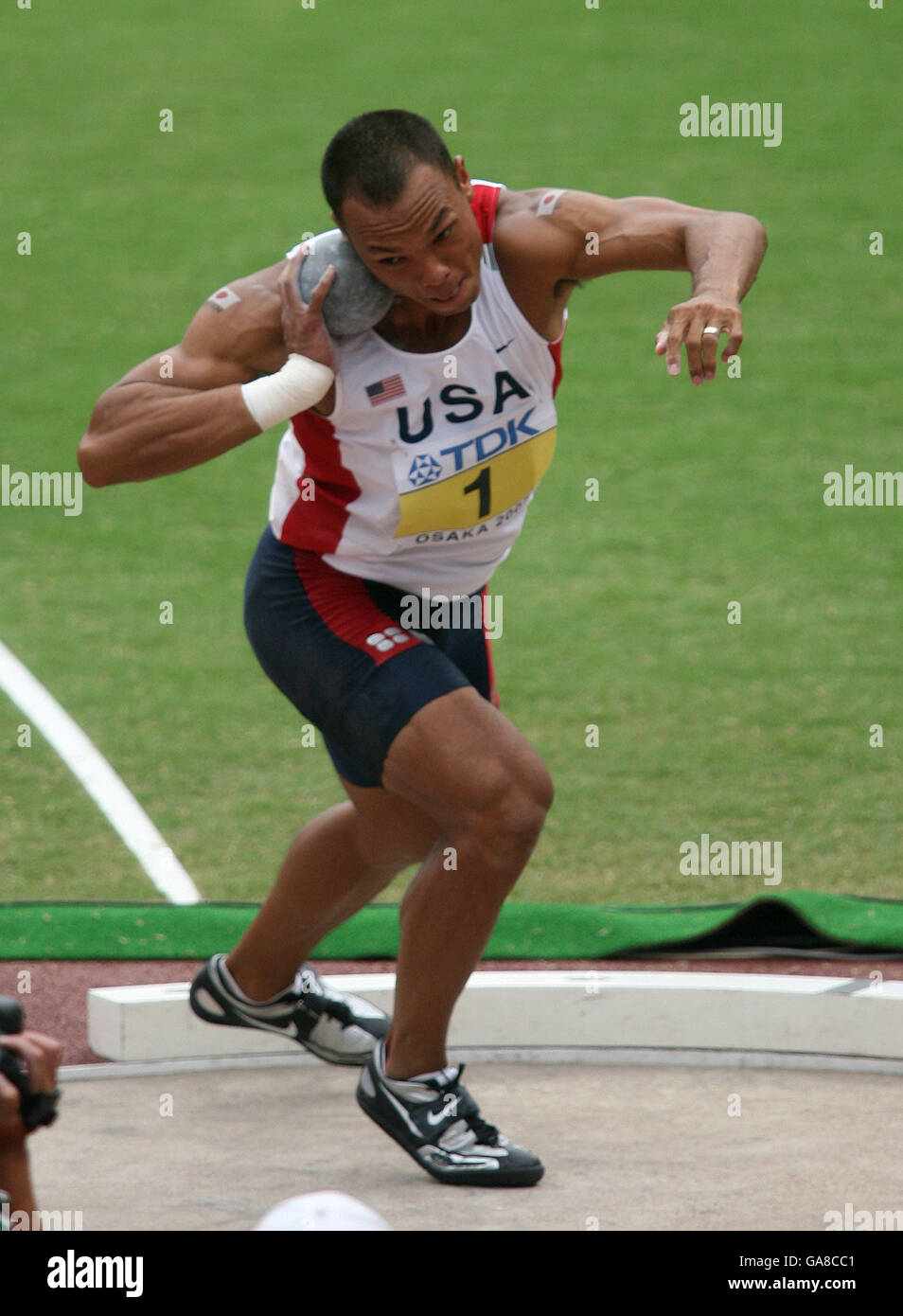 USA's Bryan Clay competes in the shot putt as part of the Decathlon ...