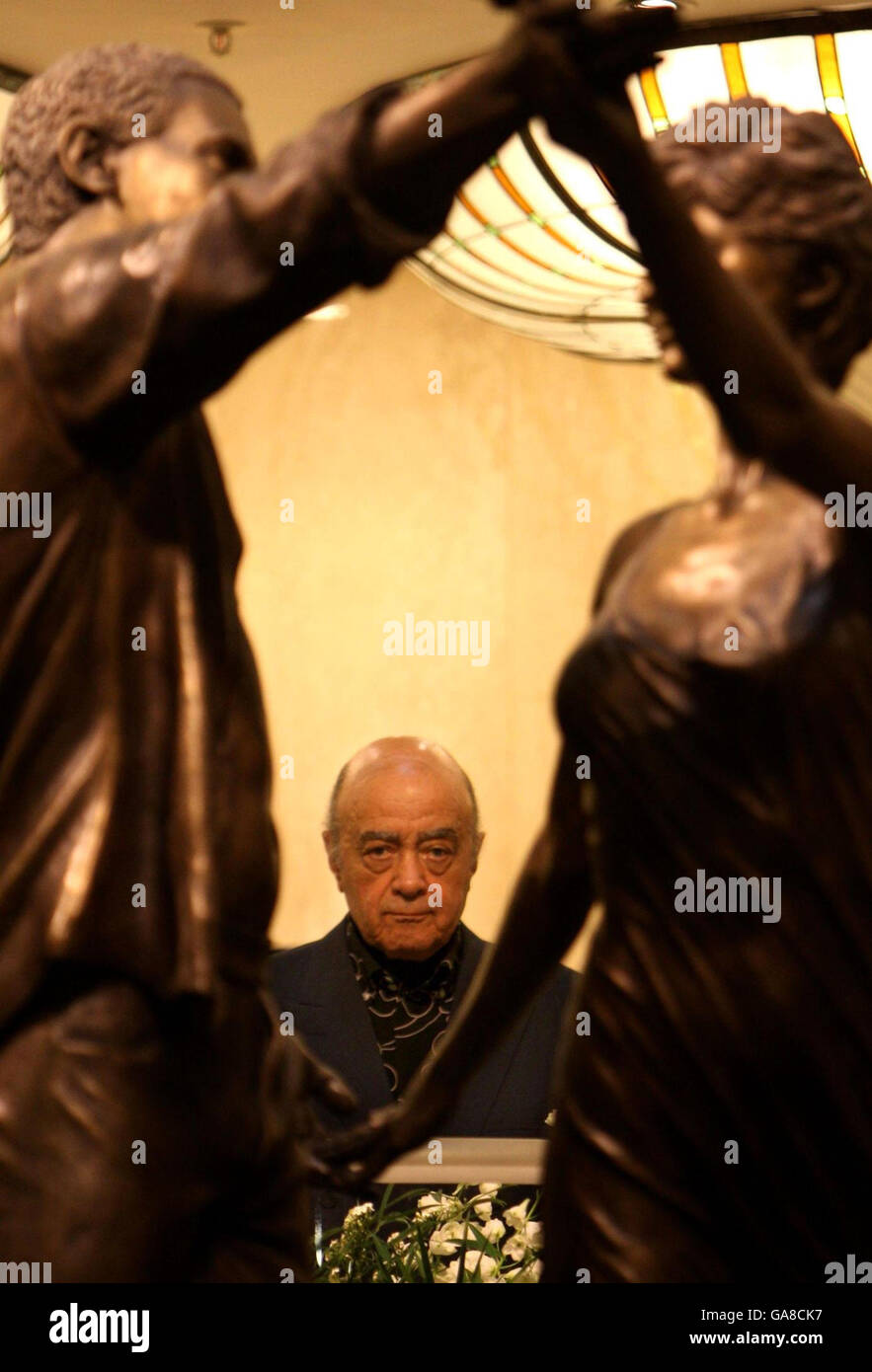 Mohammed Al Fayed stands during a 2 minute silence, in memory of his ...