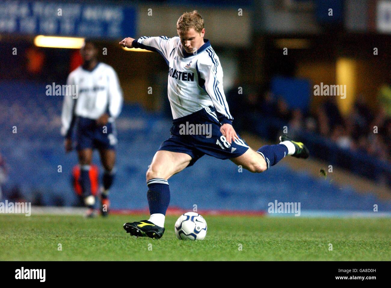 Tottenham hotspurs ben thatcher clears the ball upfield hi-res stock photography and images - Alamy