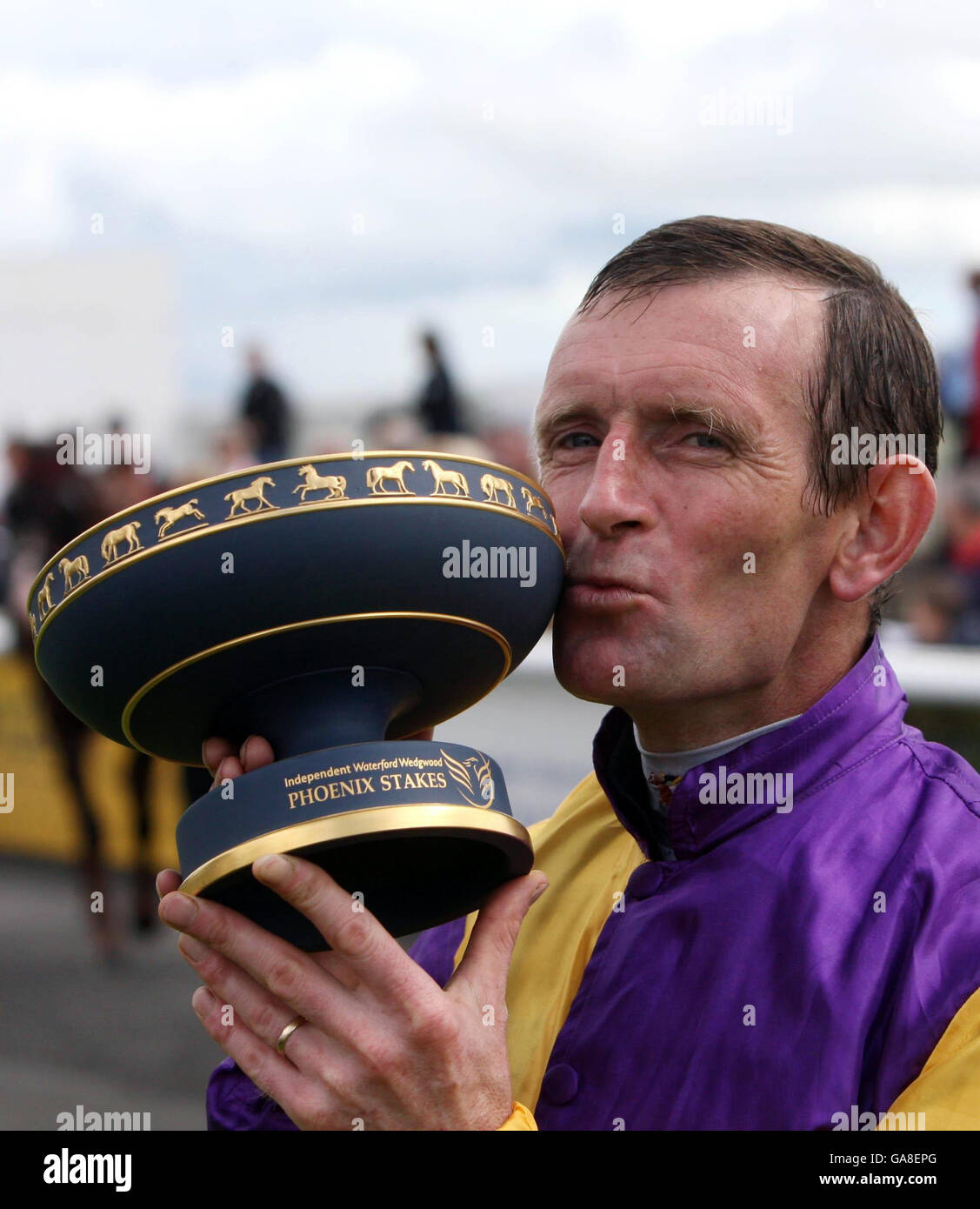 Jockey Kevin Manning with the trophy after winning the Independent ...