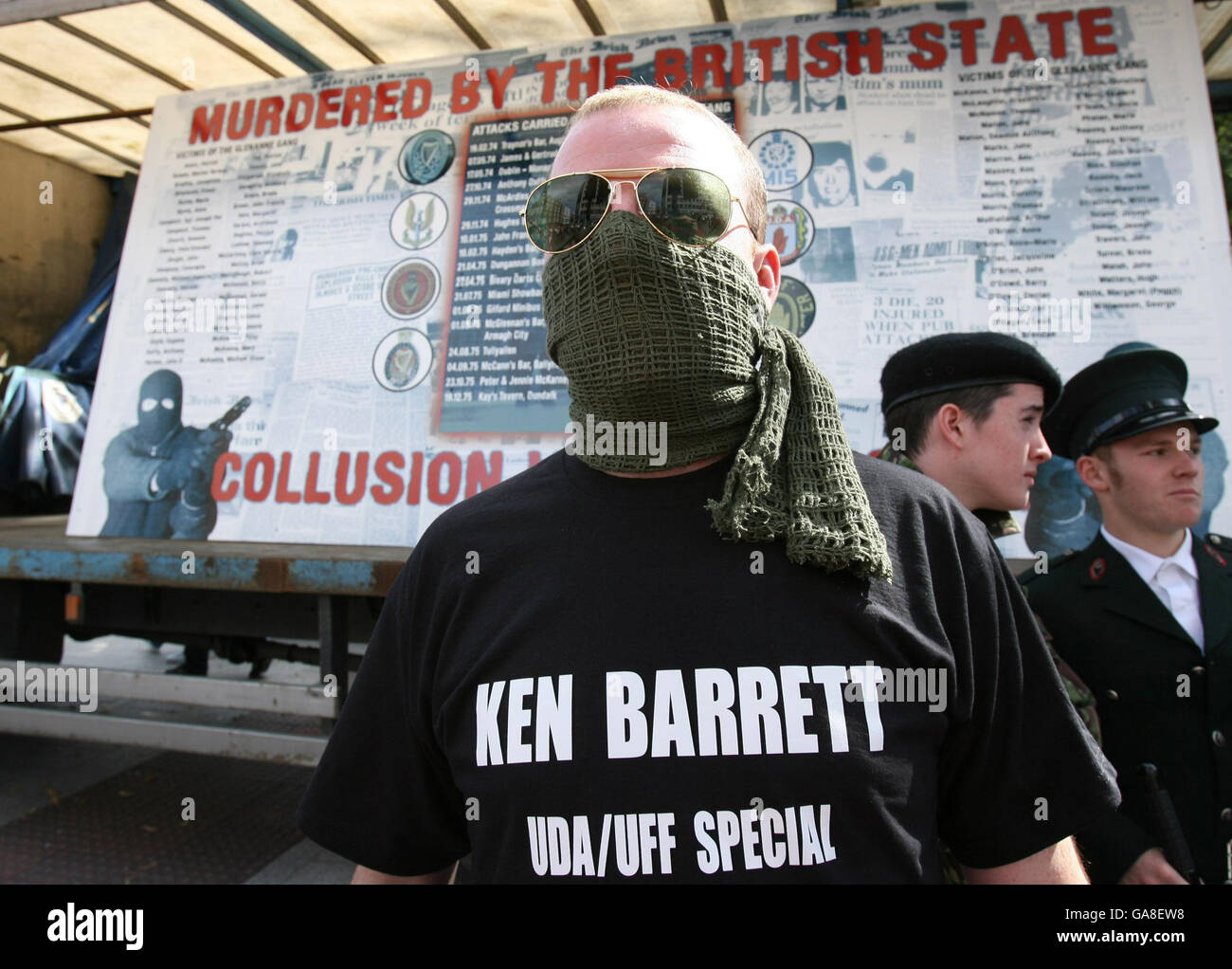 A Republican dressed as a Loyalist terrorist takes part in a Republican ...