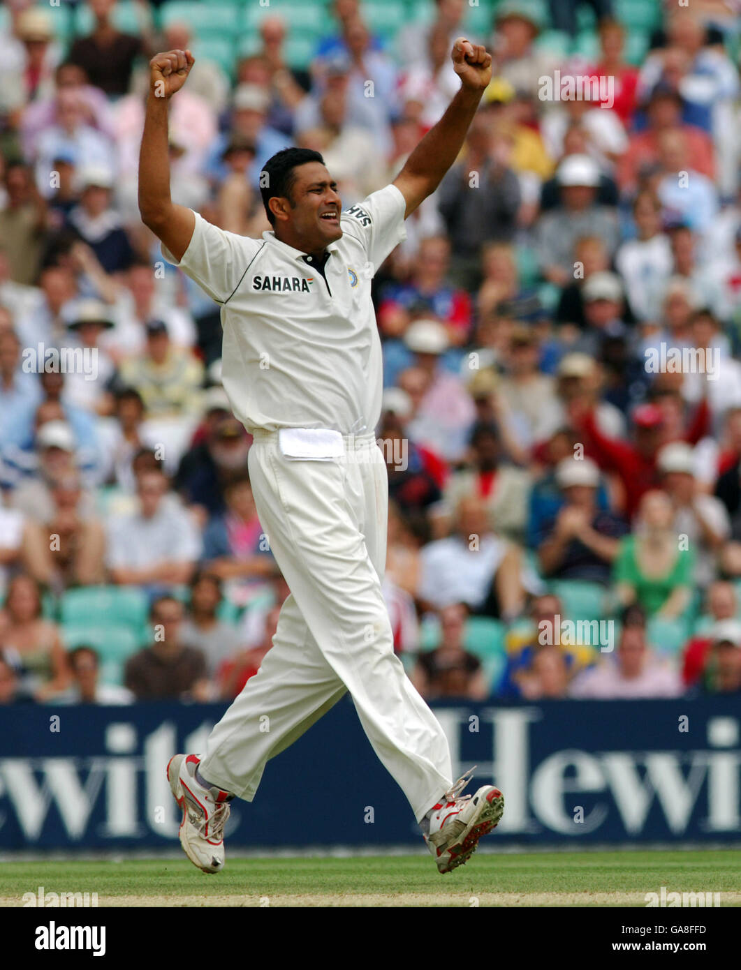 India's Anil Kumble celebrates claiming the wicket of England's ...