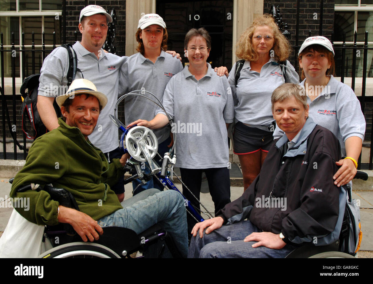 Seven multiple sclerosis sufferes from left to right standing hi-res ...