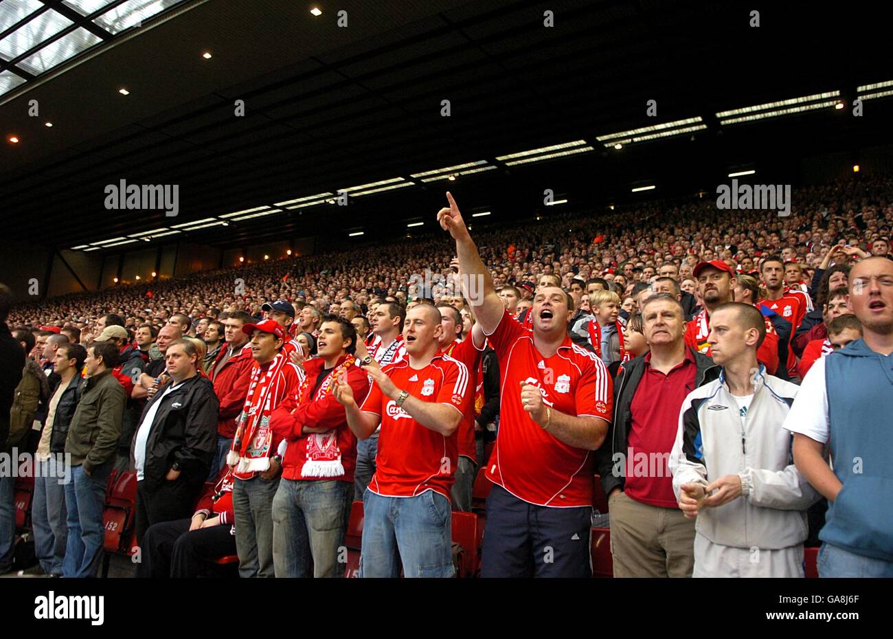 Chelsea fans cheer on their team hi-res stock photography and images ...
