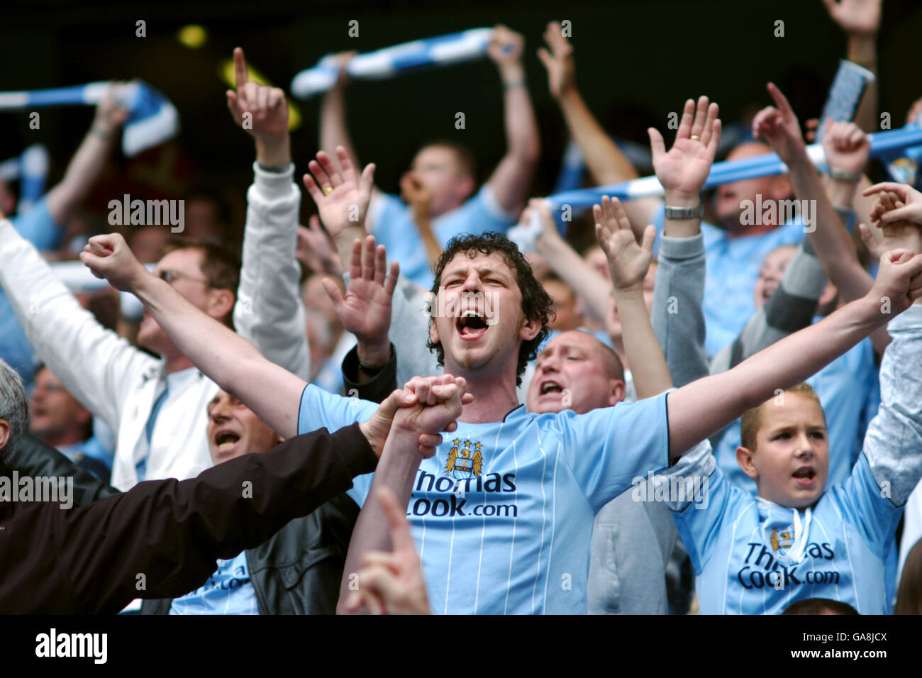 Manchester City fans celebrate their sides first goal of the game Stock ...