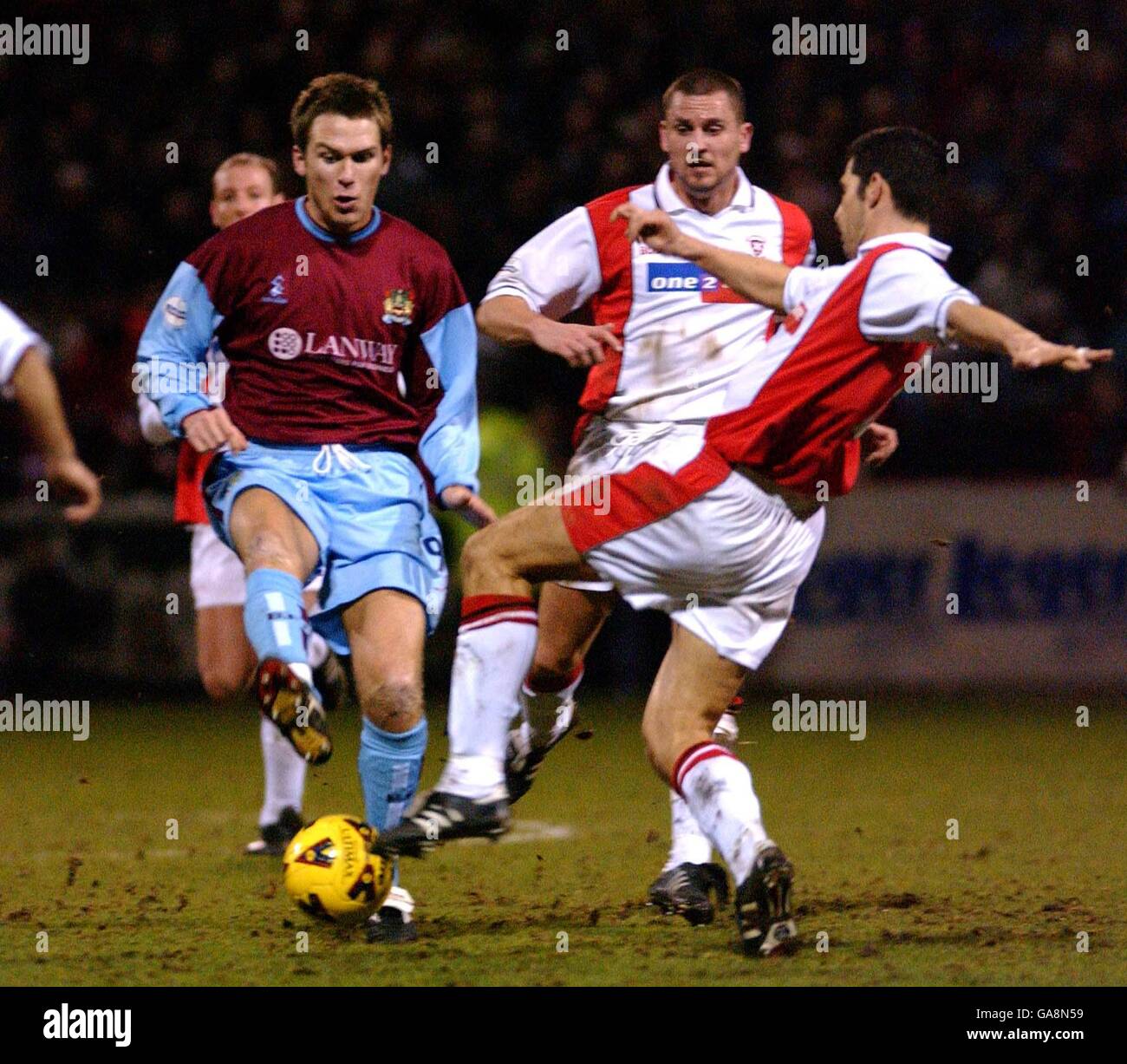 Rotherham United's Martin McIntosh tackles Burnley's Gareth Taylor ...