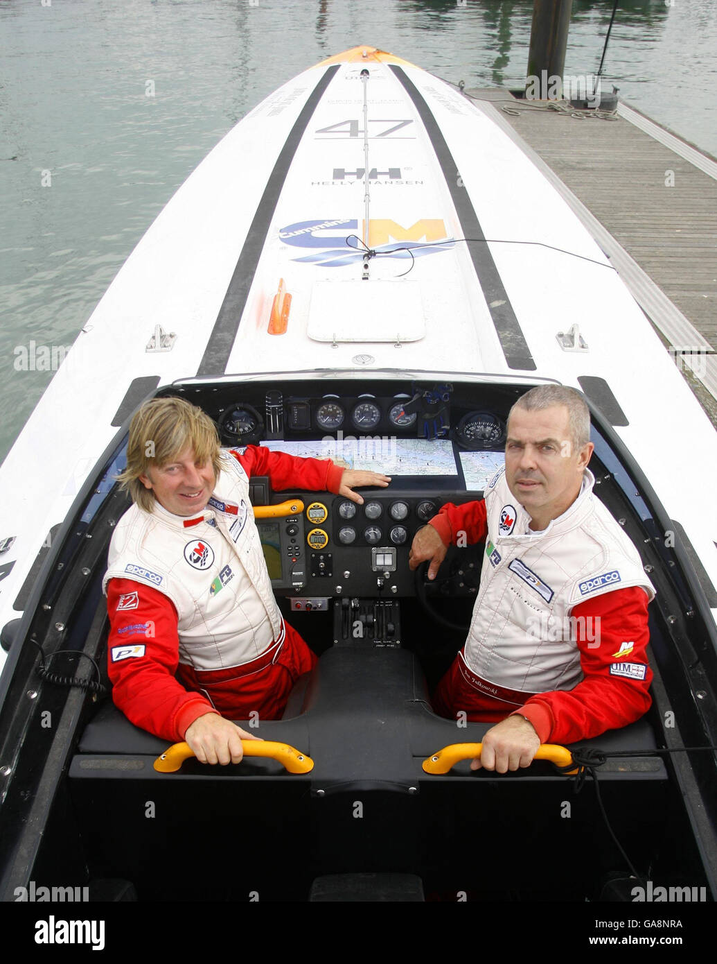 Drew Langdon (left) aboard his P1 powerboat Buzzi Bullet III with his ...